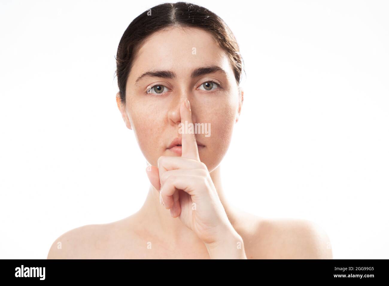 Plastic nose surgery. Portrait of young caucasian woman touching her ...
