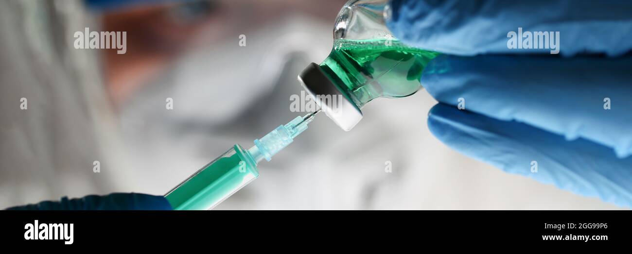 Doctor syringe taking dose hi-res stock photography and images - Alamy