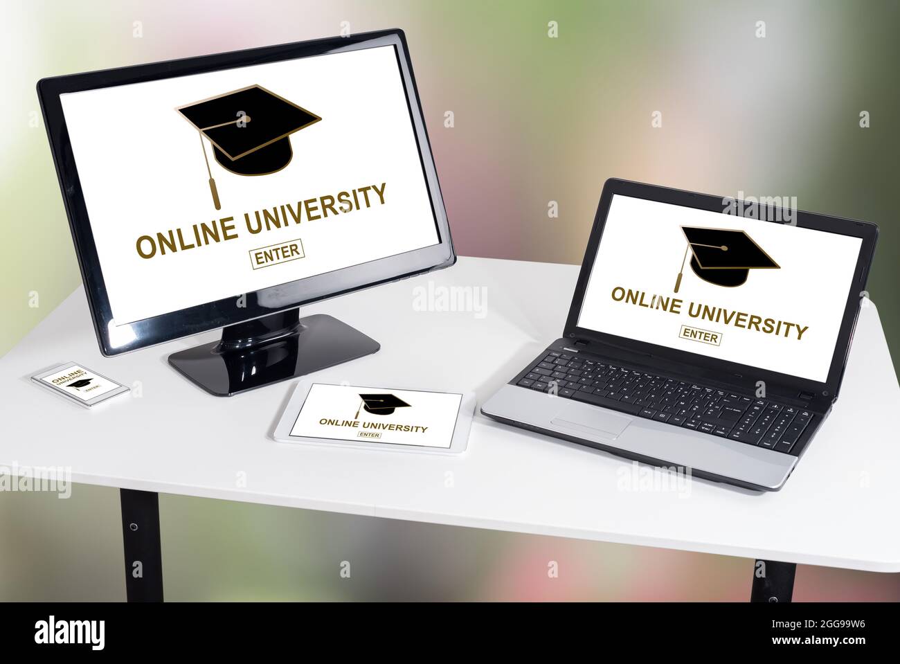 Online university concept shown on different information technology ...