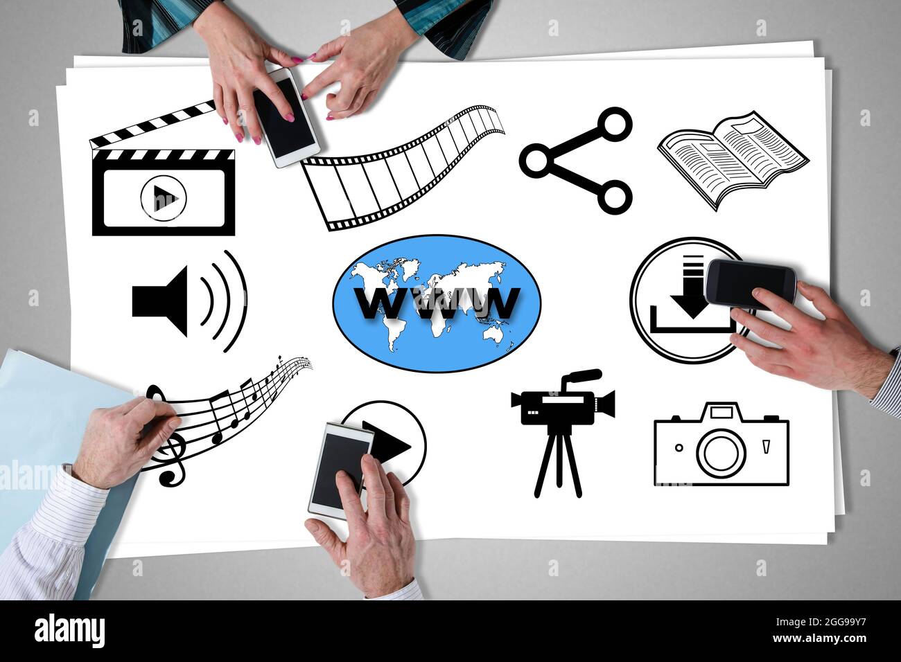 Social information sharing concept placed on a desk with hands using ...