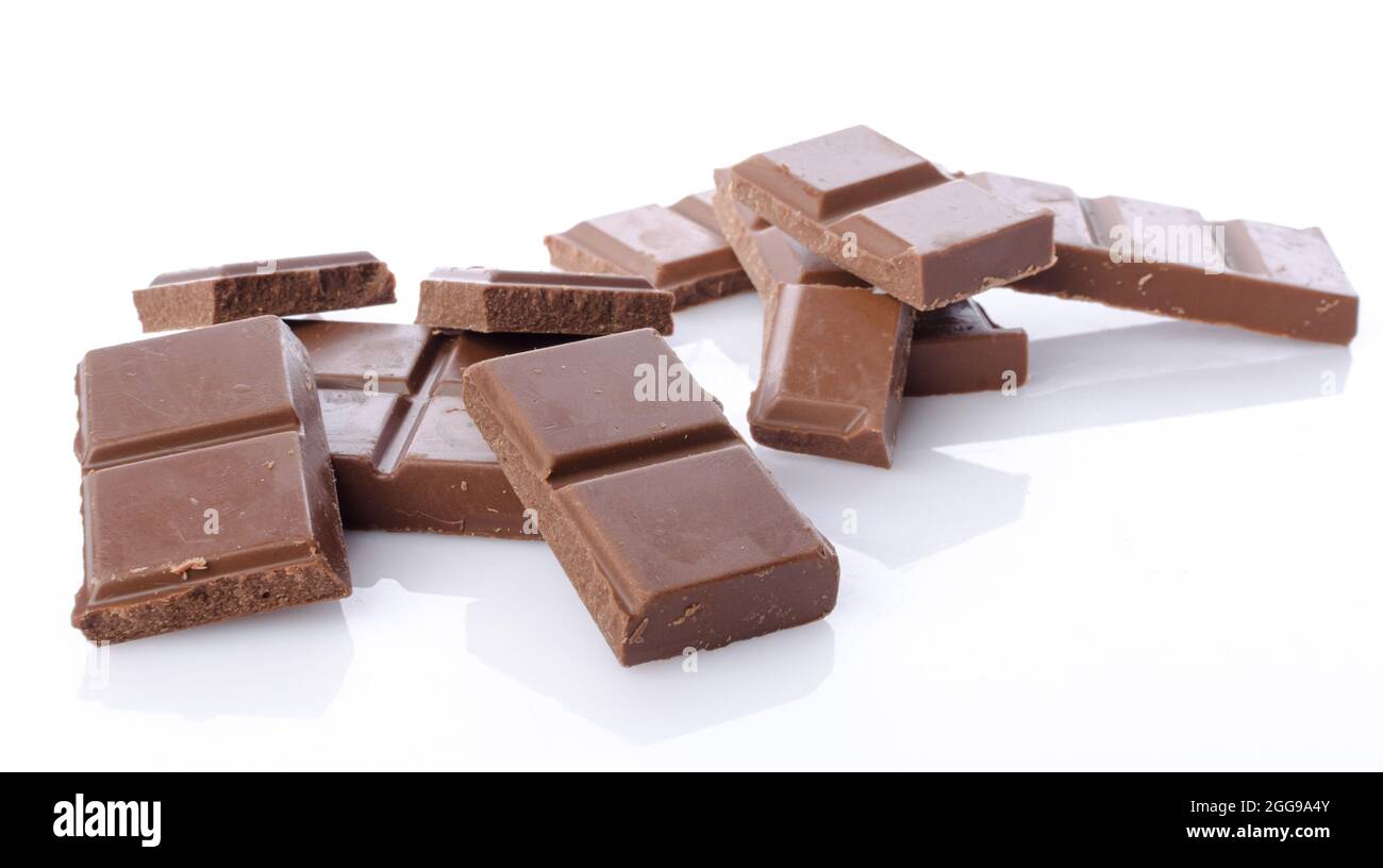 Chocolate squares, isolated on white Stock Photo - Alamy