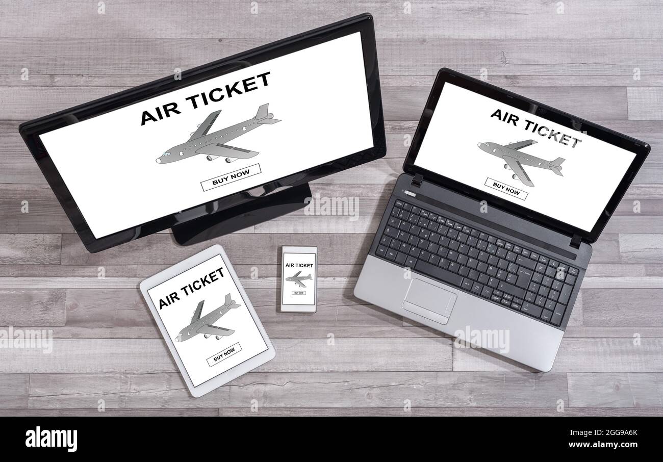 Air ticket booking concept shown on different information technology ...