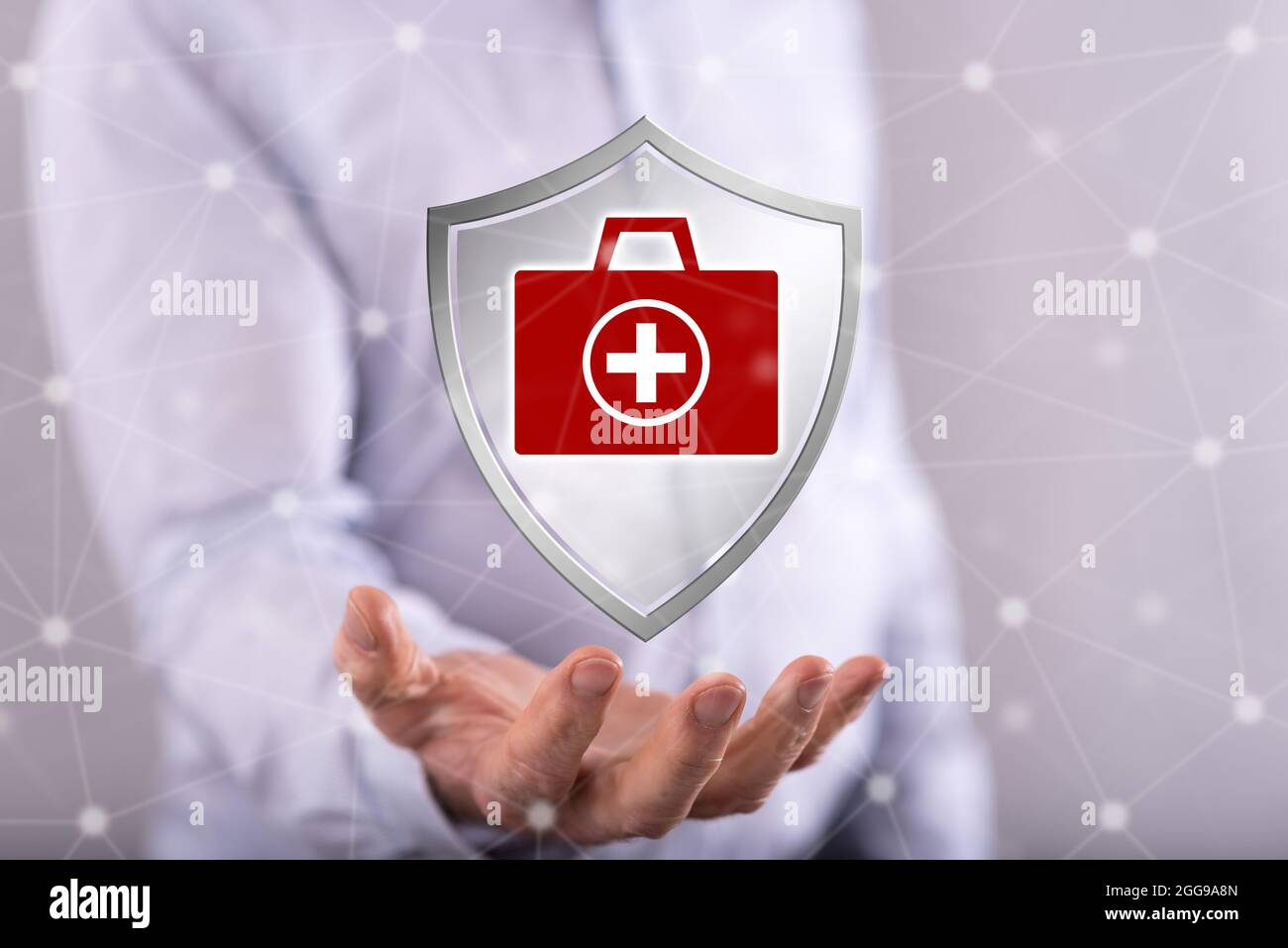 Health protection concept above the hand of a man in background Stock ...