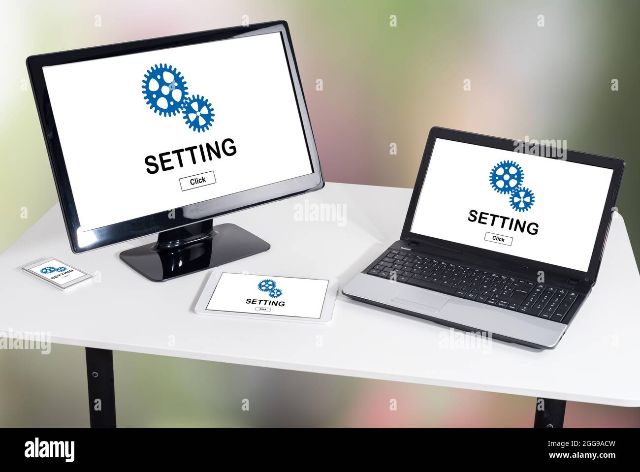 Setting concept shown on different information technology devices Stock ...