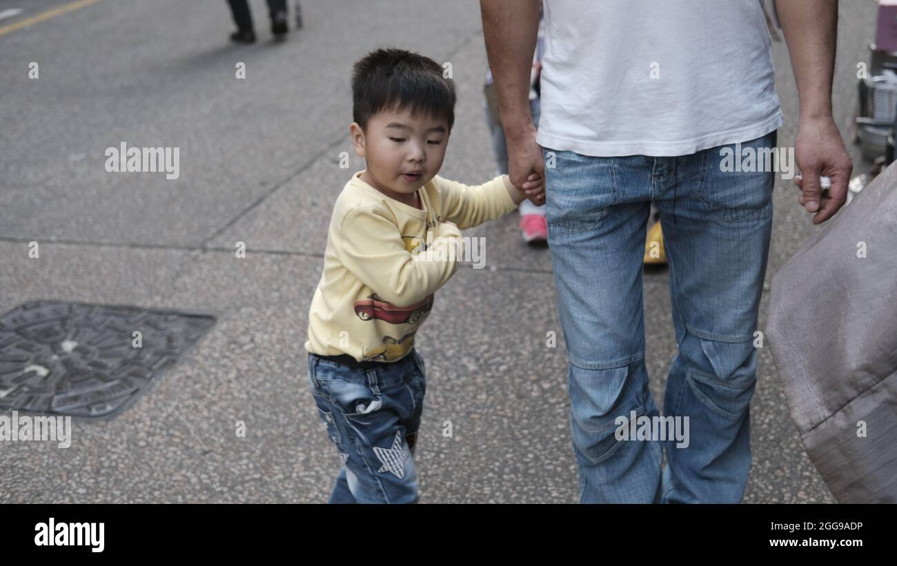 Little Boy Walking With Man Sham Shui Po Apliu Street Flea Market Area ...