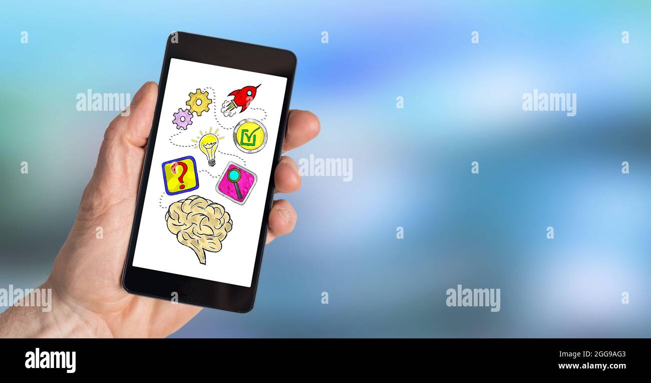 Hand holding a smartphone with problem solving concept Stock Photo - Alamy