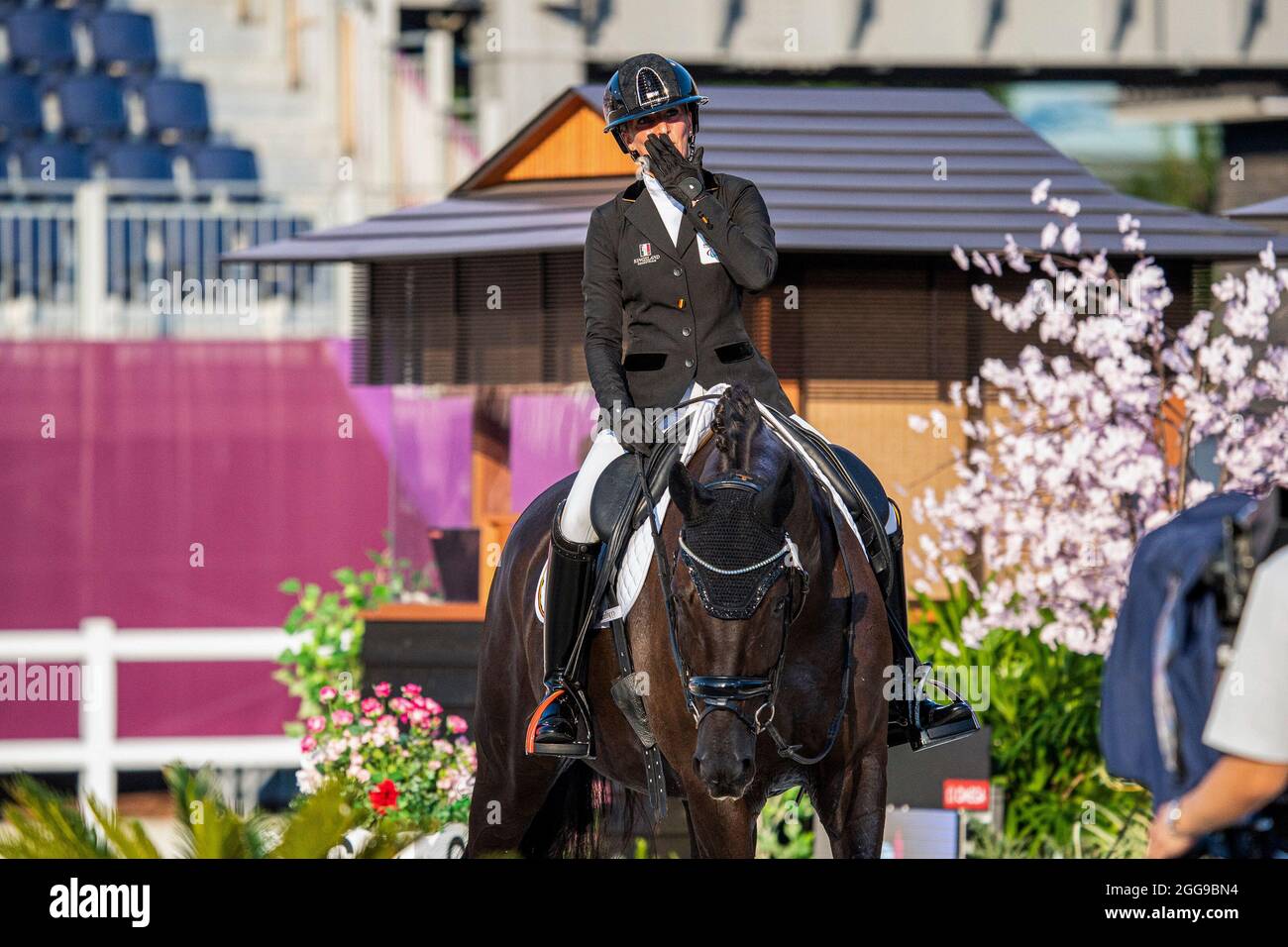 Paralympic jockey Manon Claeys reacts during the Freestyle Test in the ...