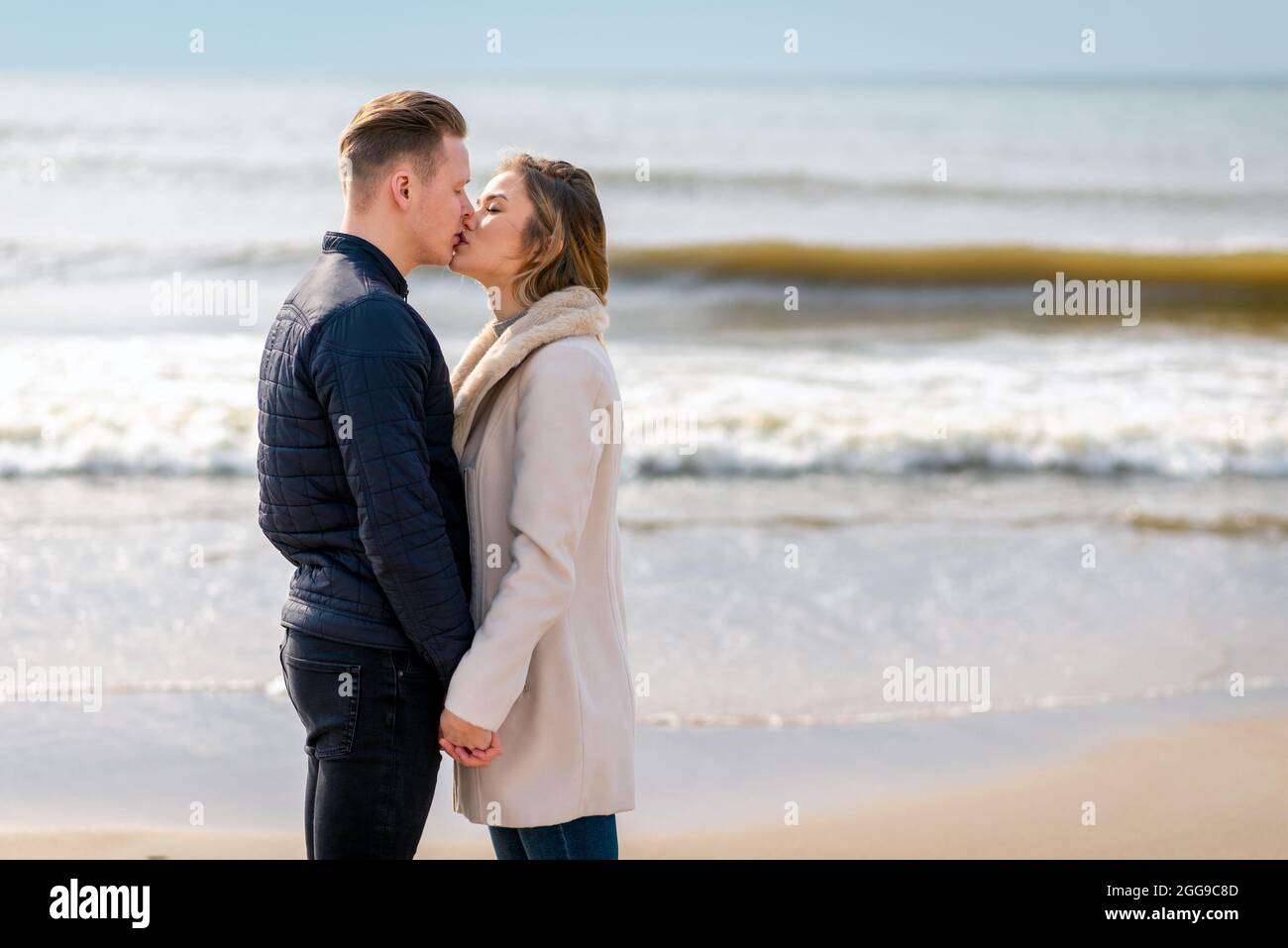 Young couple kissing in love outdoor.Stunning sensual outdoor portrait ...