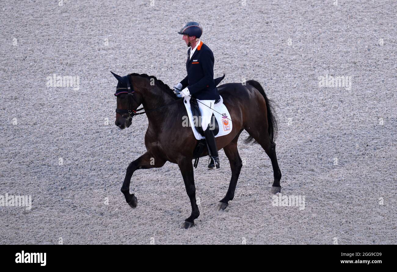 Netherland’s Frank Hosmar riding Alphaville competes in the Equestrian ...