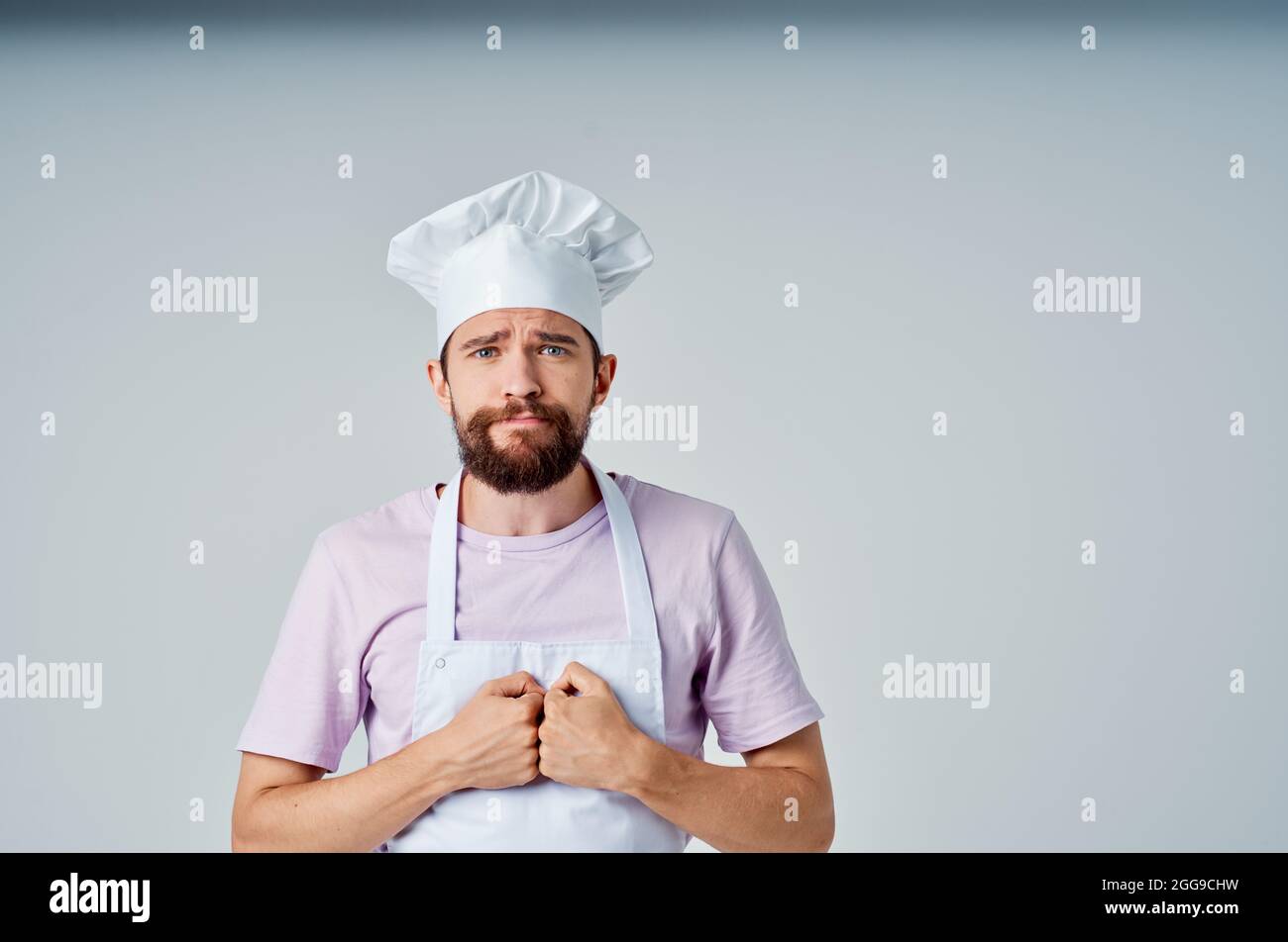 emotional male chef working in a restaurant kitchen service Stock Photo ...