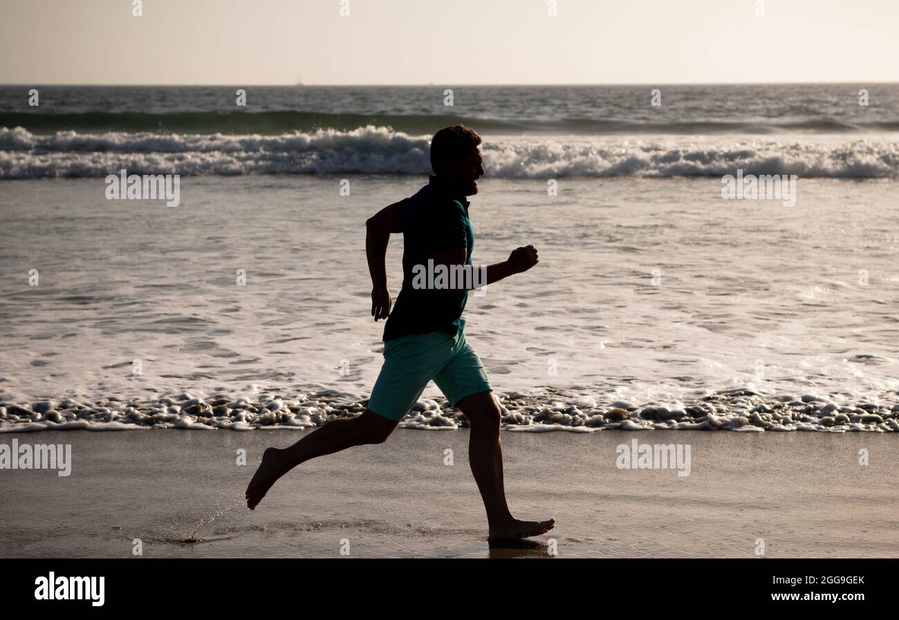 sport athlete run fast to win in the ocean. morning workout activity ...