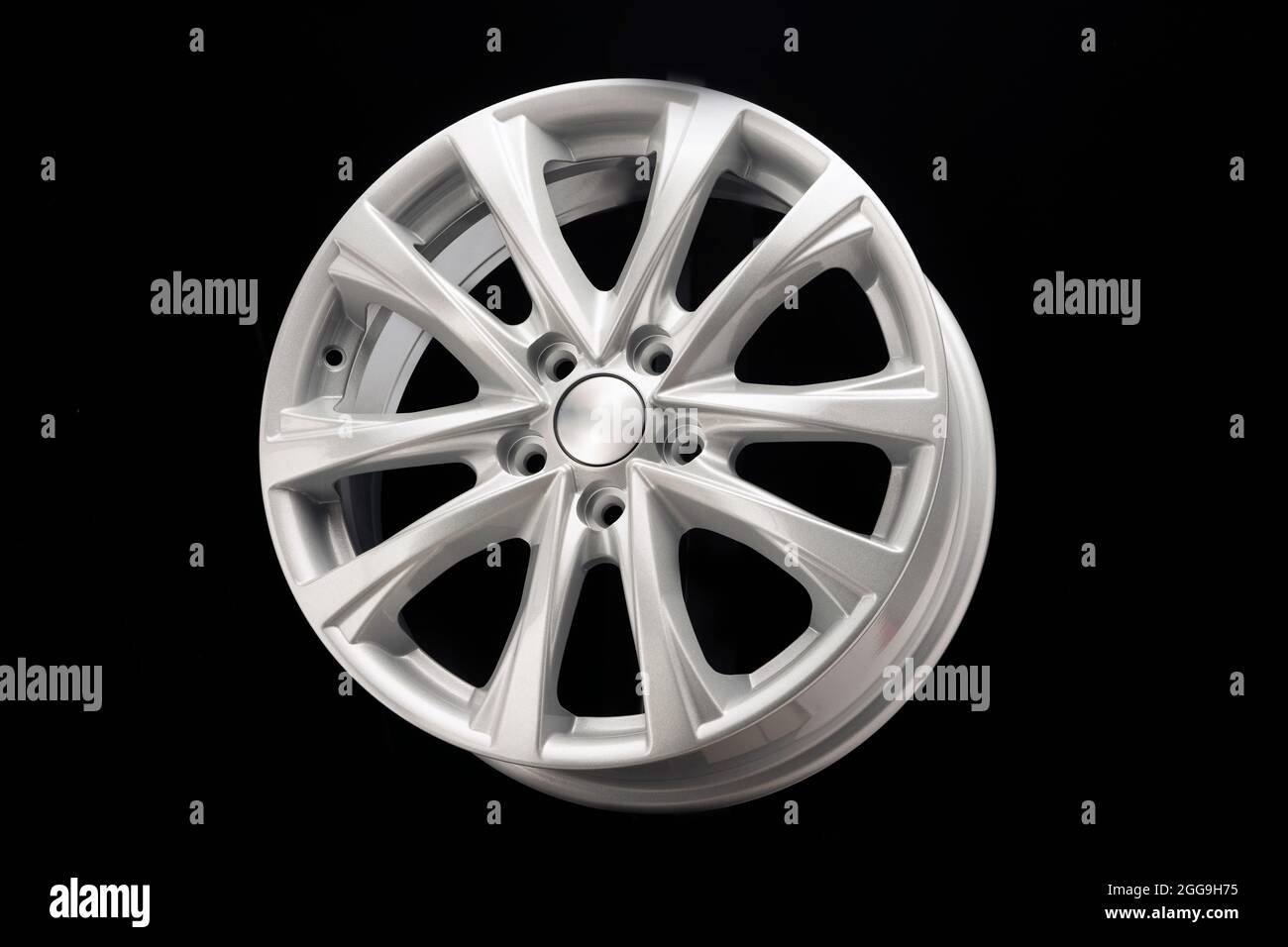 alloy wheel close-up. New modern auto parts, black background Stock ...