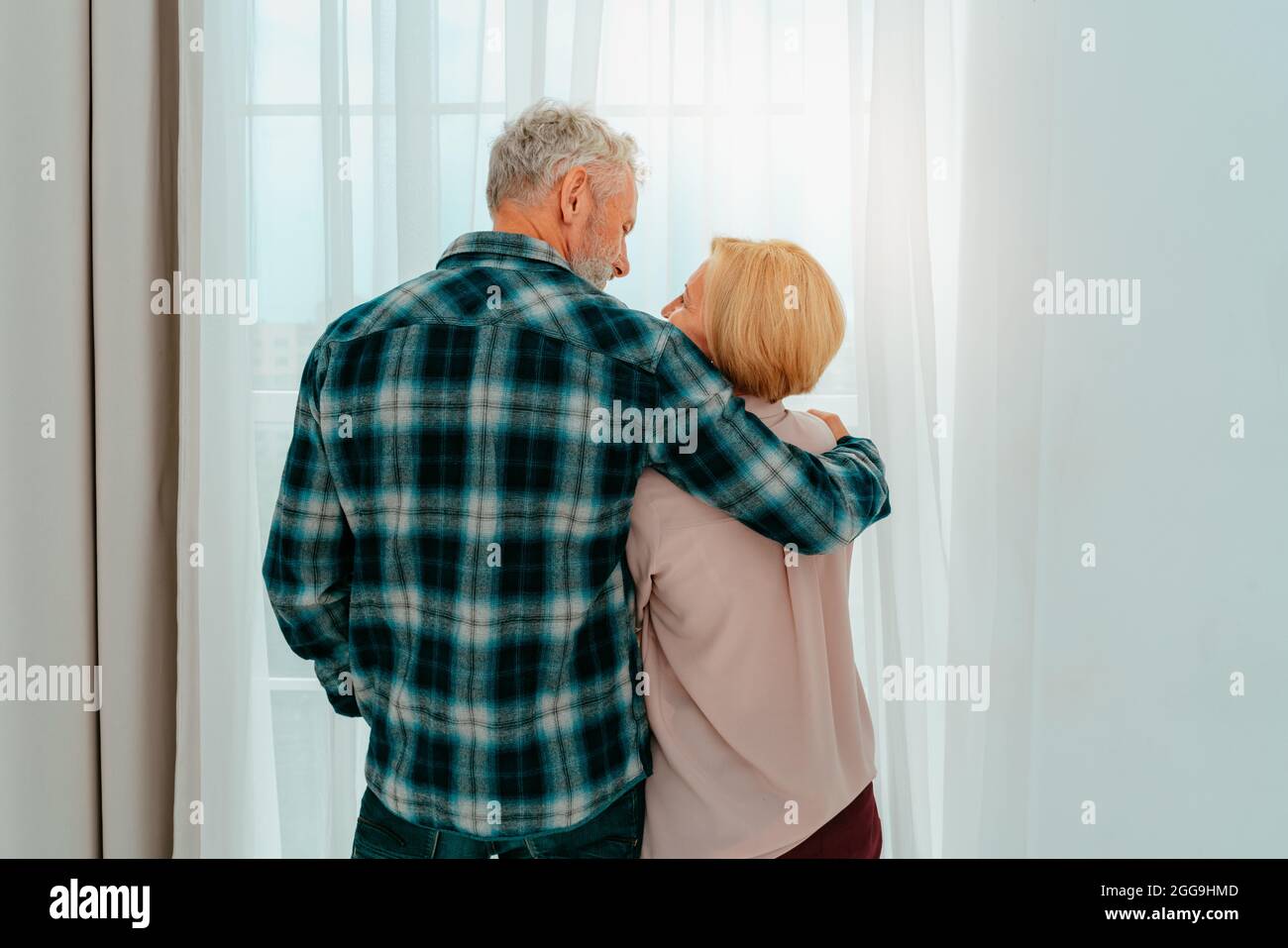 Husband and wife hug hi-res stock photography and images - Alamy