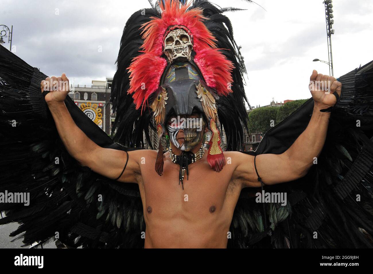 A man dressed as aztec warrior takes part during a ceremony before the ...