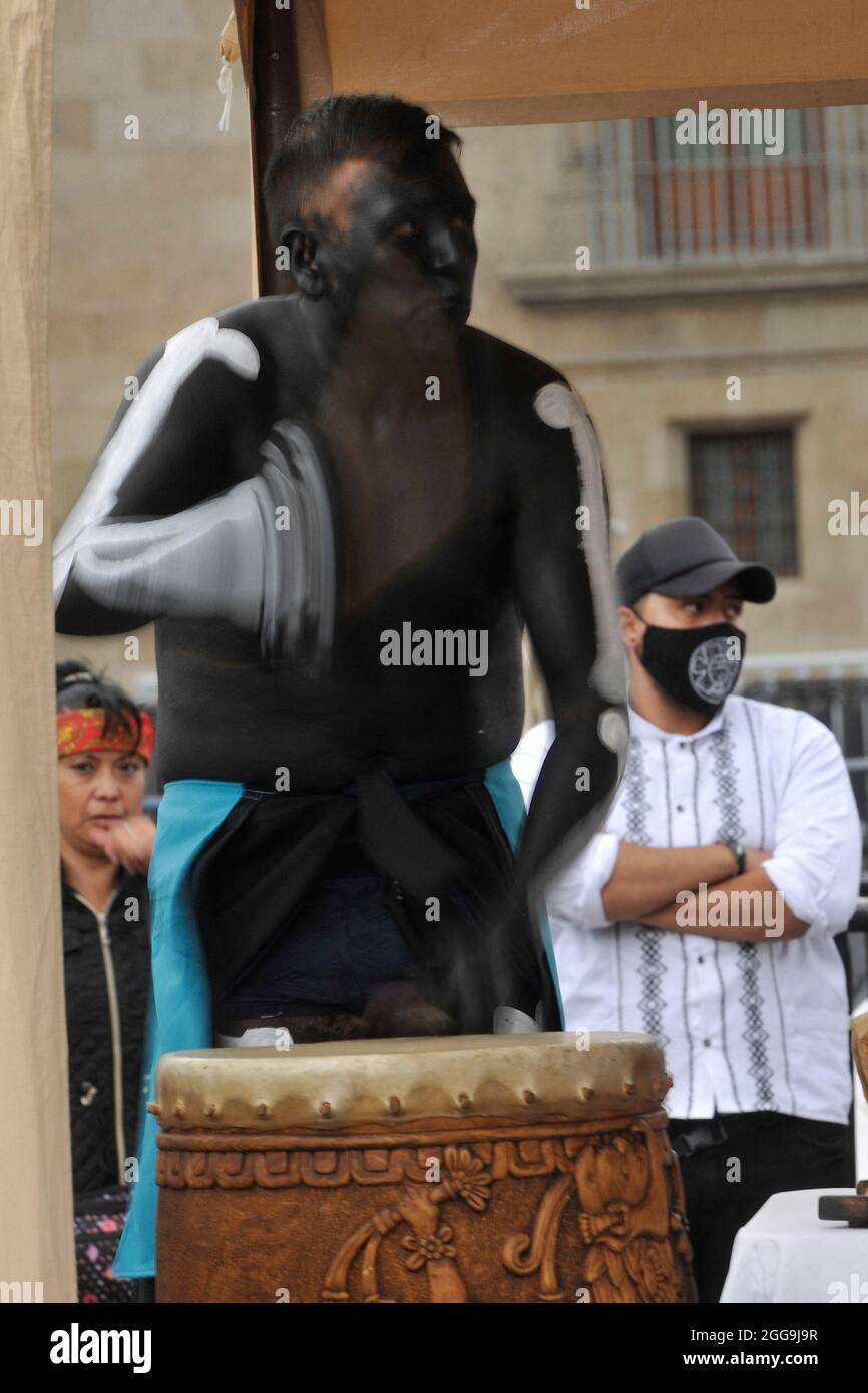 A man dressed as aztec warrior takes part during a ceremony before the ...