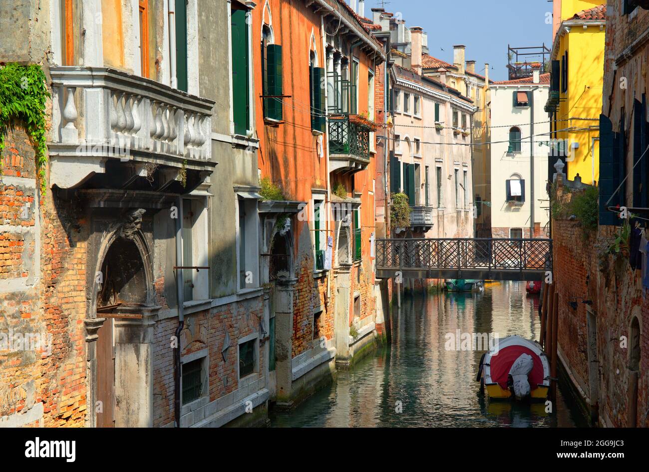 View of Venice canals among the beautiful and colorful buildings, Italy ...