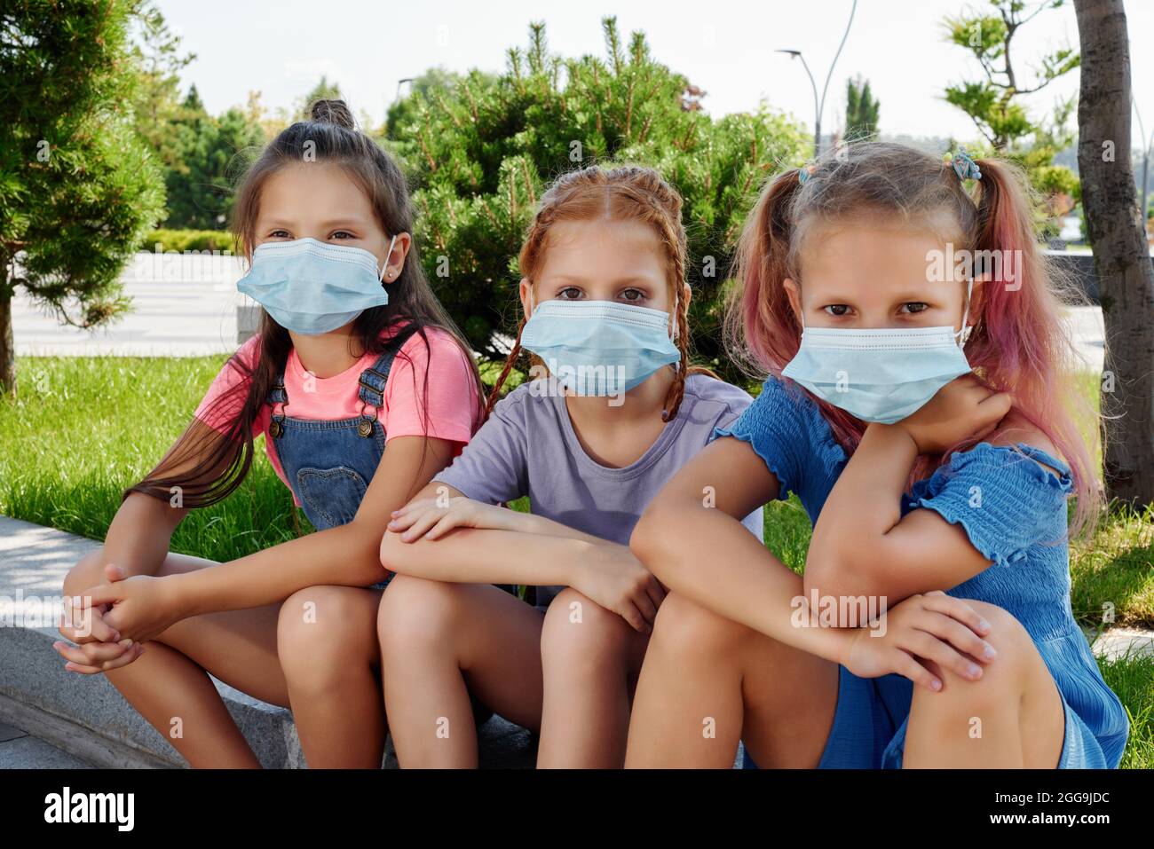 Little child girls wearing mask for protect Stock Photo - Alamy