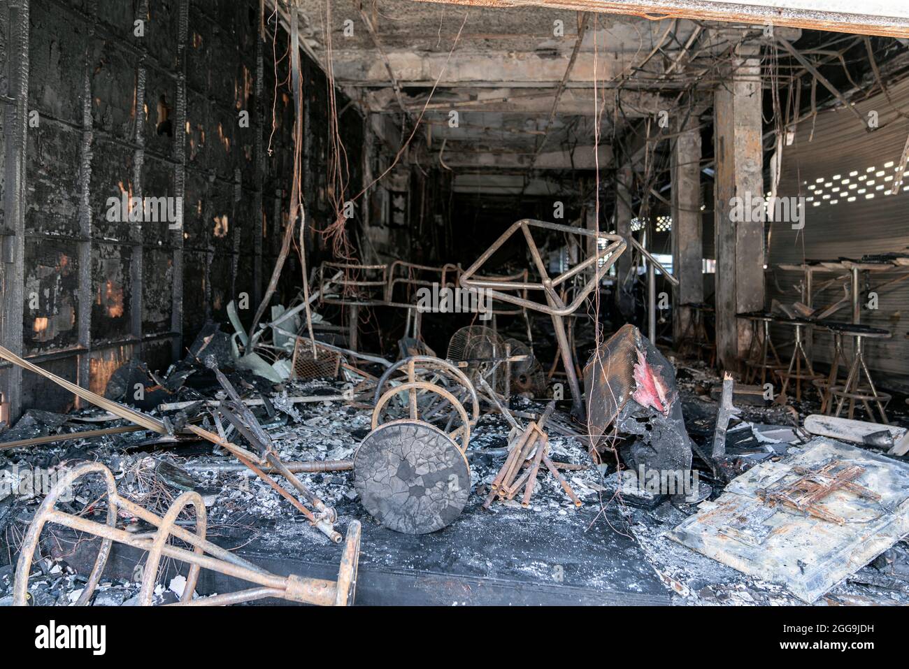 a burnt-out cafe in Thailand, insurance of premises against fire. Burnt ...