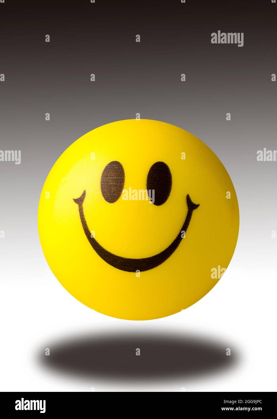 Famous Smiley face icon emoji on a bouncing rubber ball, have a nice ...