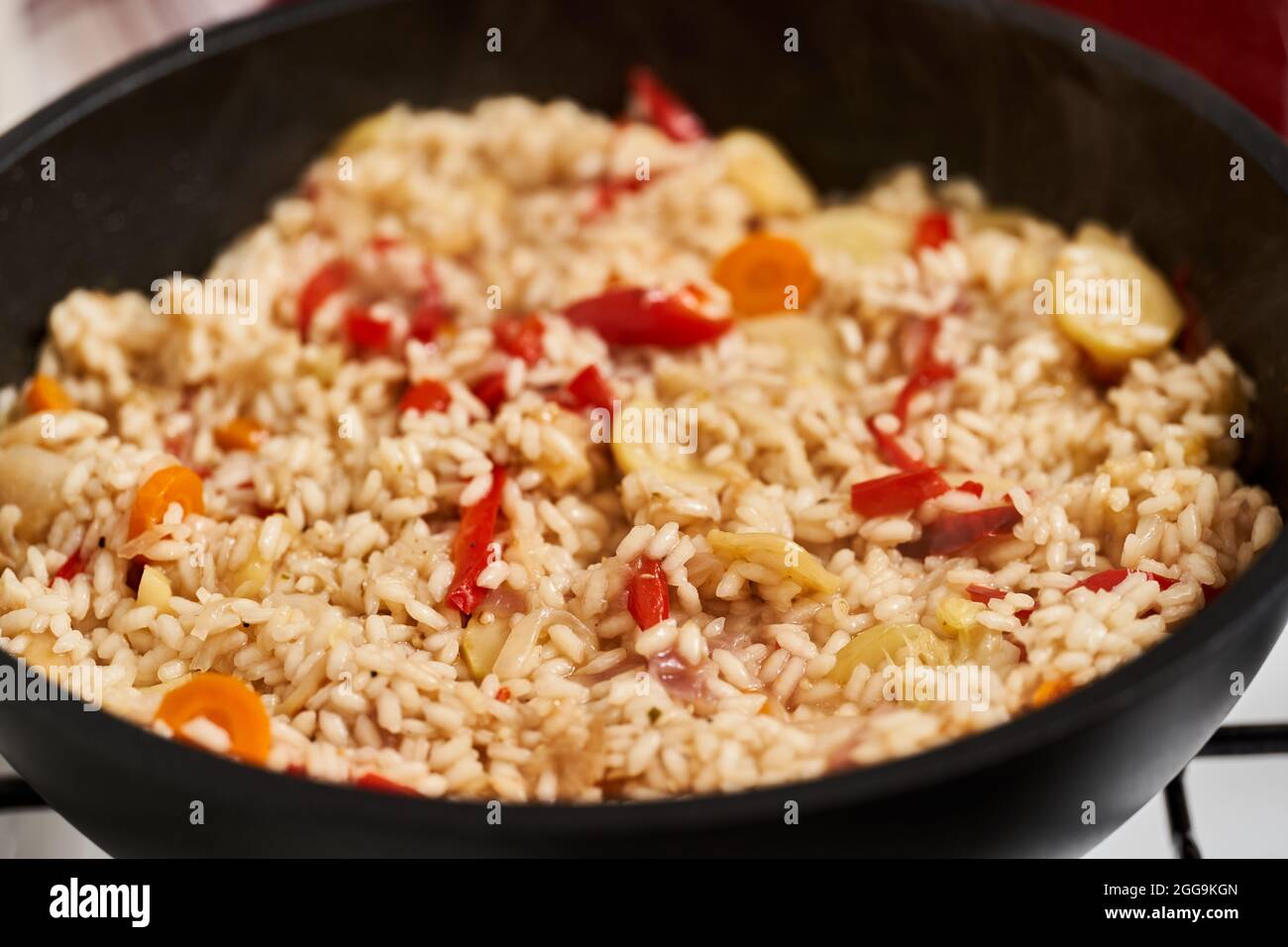 Mushroom risotto in pan hi-res stock photography and images - Alamy