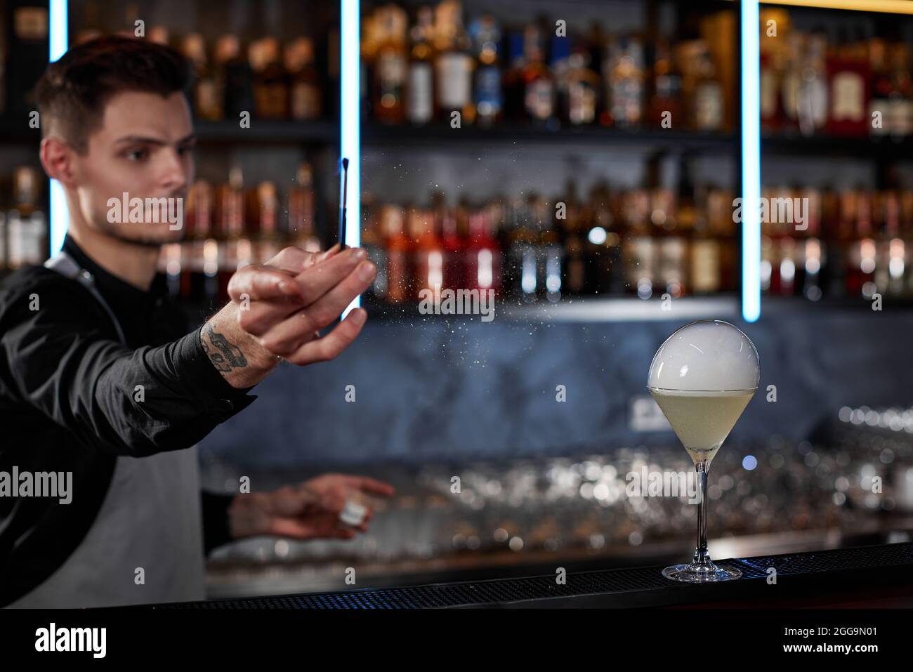barman is making cocktail with smoky air bubble Stock Photo - Alamy