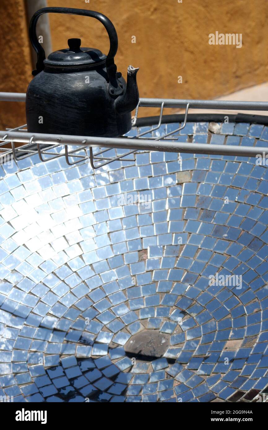A kettle on a homemade solar cooker, Chile Stock Photo - Alamy