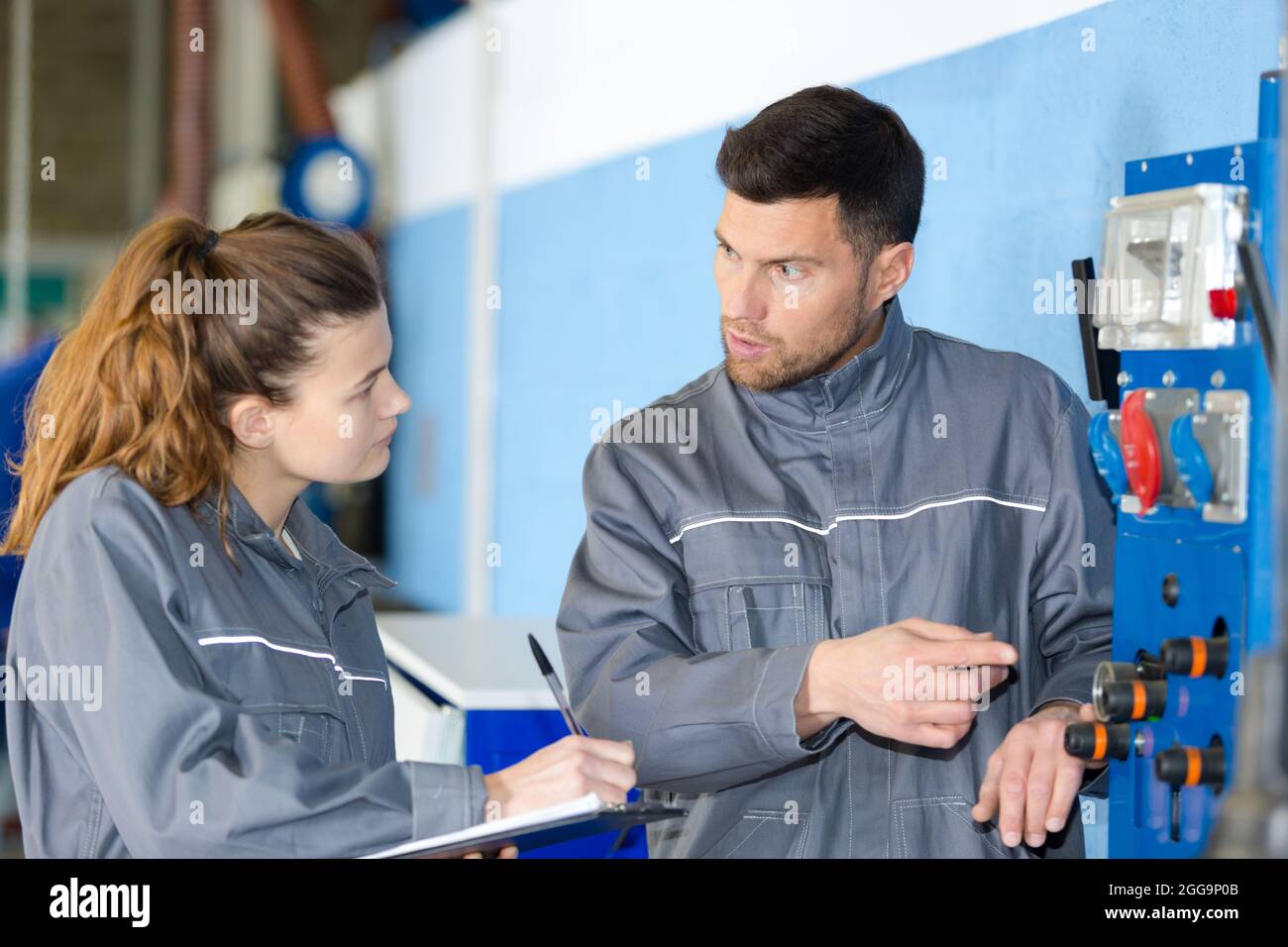 Student learning to operate lathe hi-res stock photography and images ...
