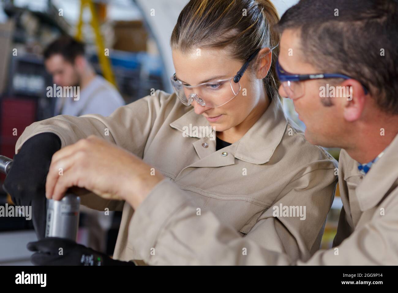 Collaboration engineering two engineers hi-res stock photography and ...