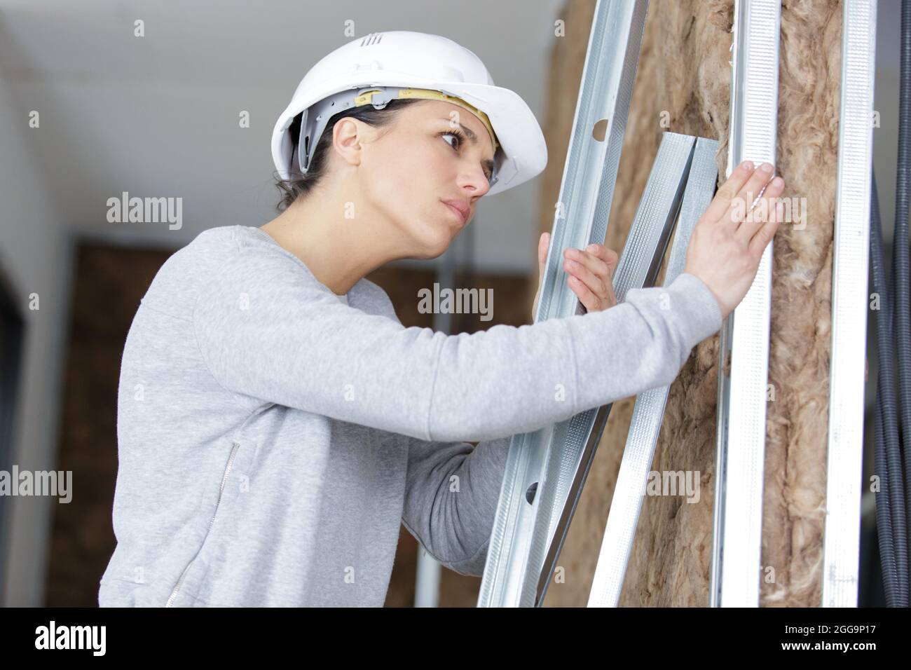 woman builder working in construction site Stock Photo - Alamy