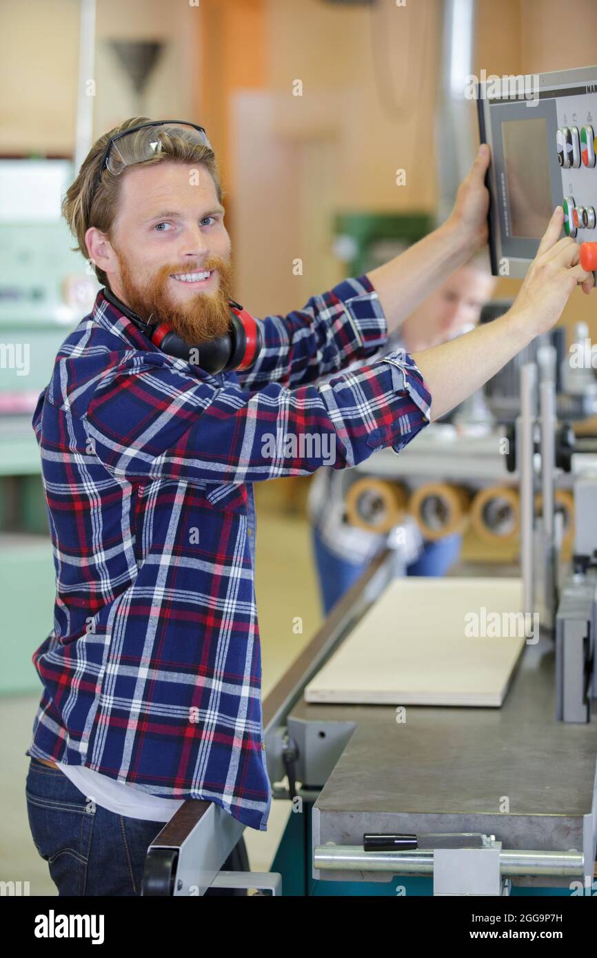 Man operating machines hi-res stock photography and images - Alamy