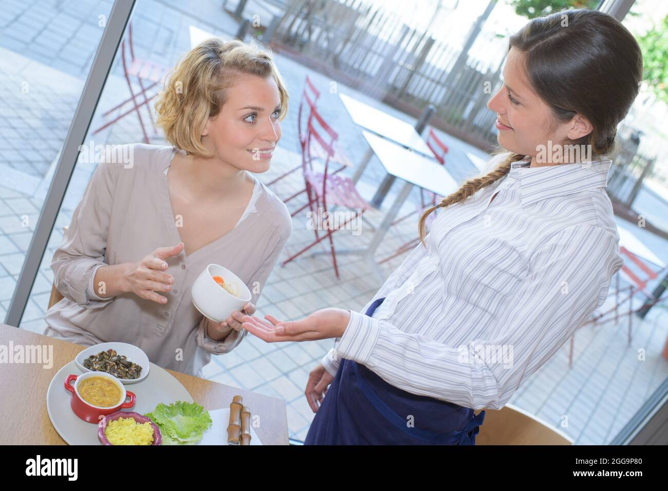 single woman having lunch in a restaurant Stock Photo - Alamy