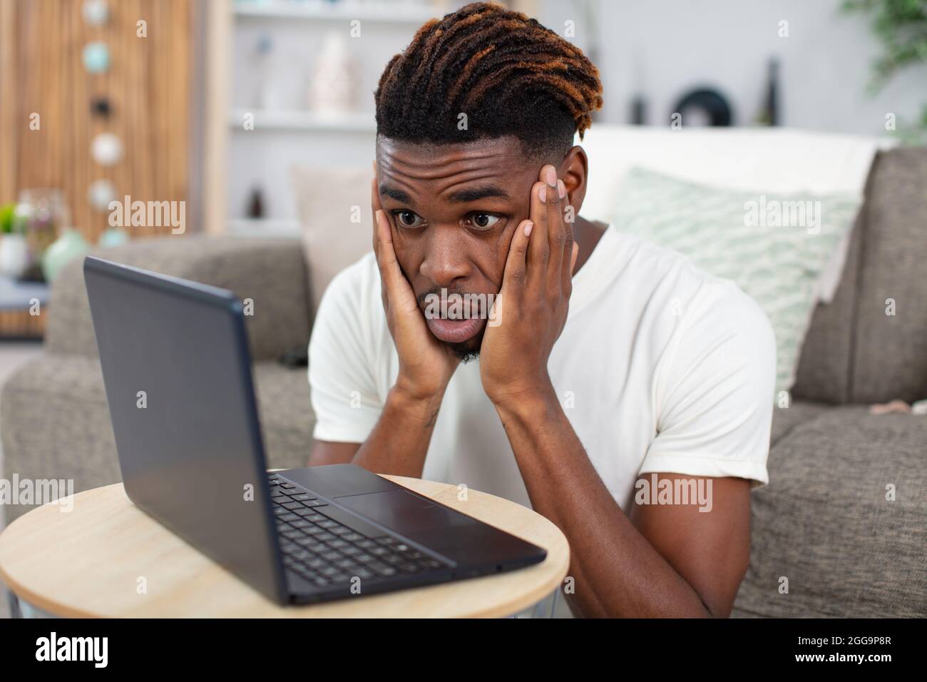 Confused man having trouble computer hi-res stock photography and ...