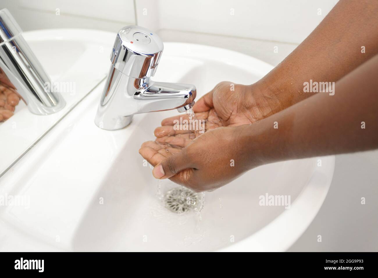 Senior male washing hands hi-res stock photography and images - Alamy