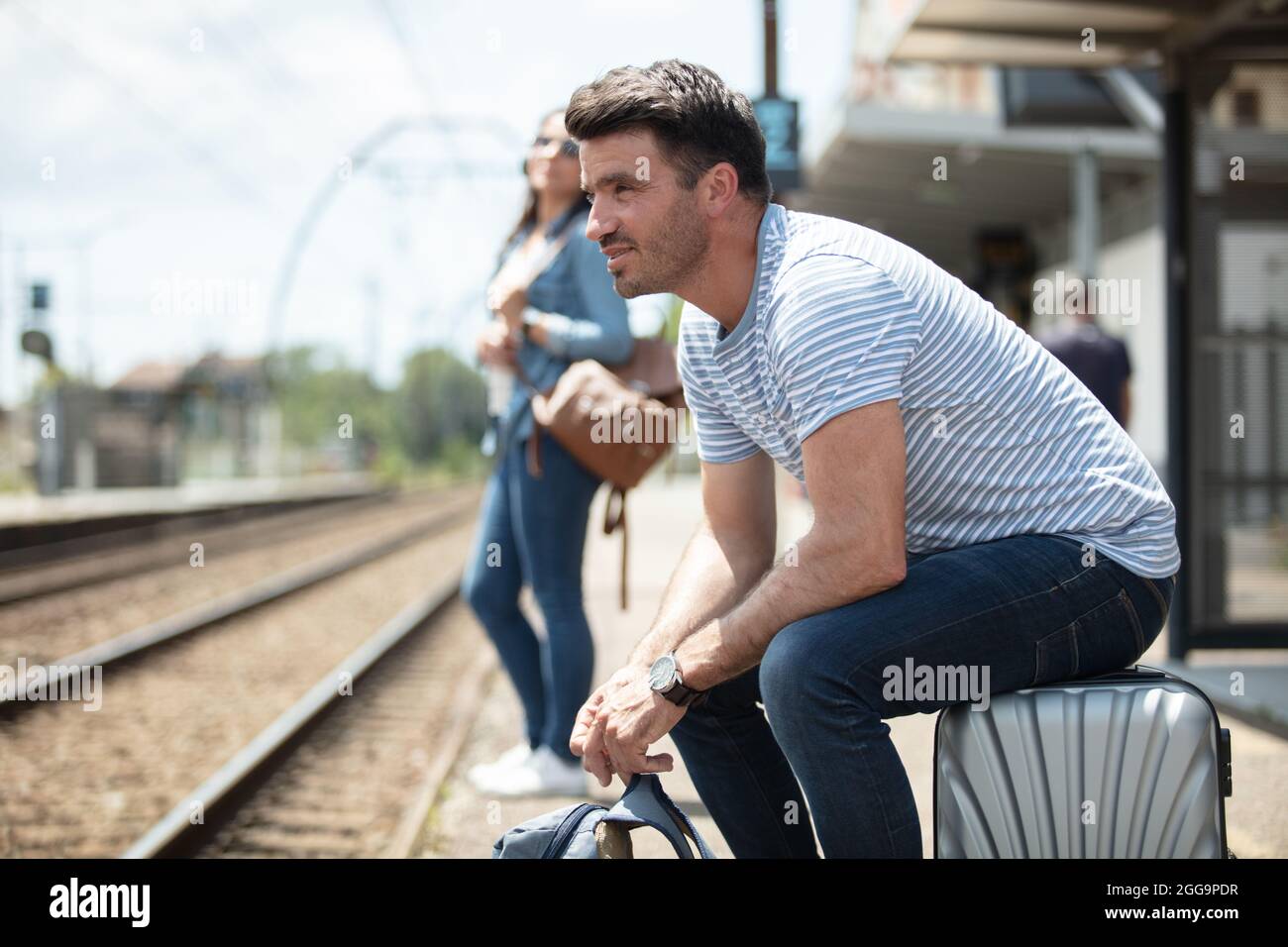 People waiting train bored hi-res stock photography and images - Alamy