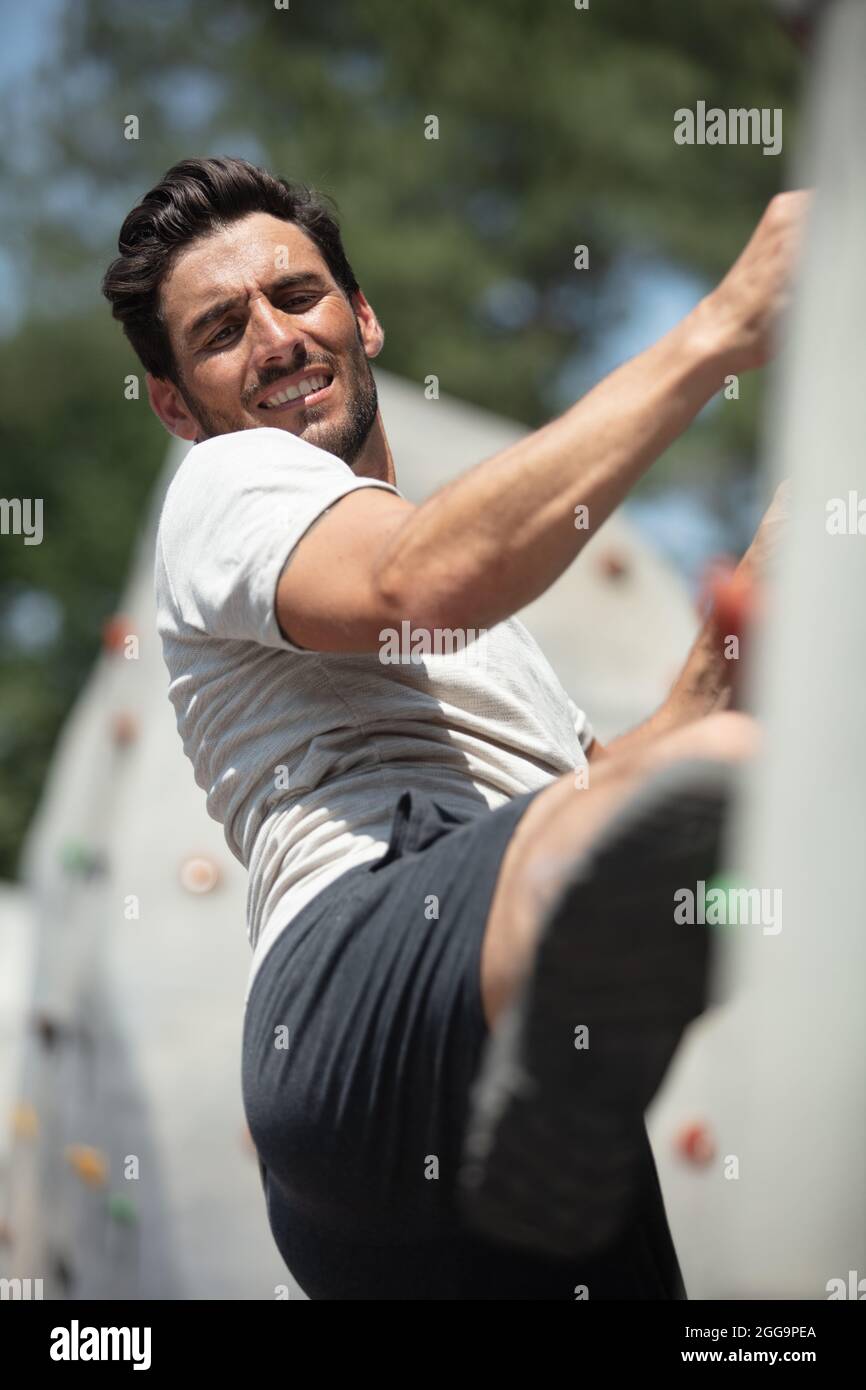 climber will gathers an artificial wall Stock Photo - Alamy
