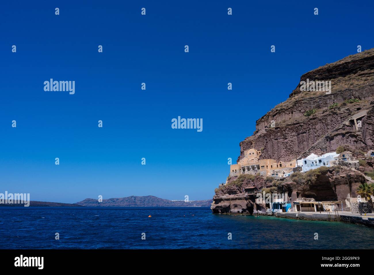 Aegean sea and caldera. Old port of Thira on Santorini island. Ancient ...