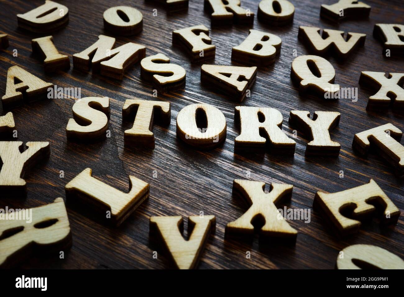 Story from wooden words as concept of storytelling Stock Photo - Alamy