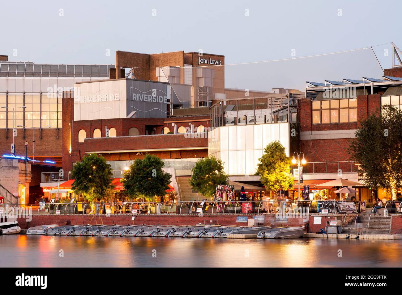 A warm summers evening on the Thames riverside at Kingston upon Thames ...