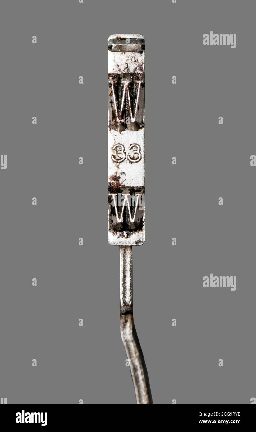 Macro of a old typewriter hammer Letter A Stock Photo - Alamy