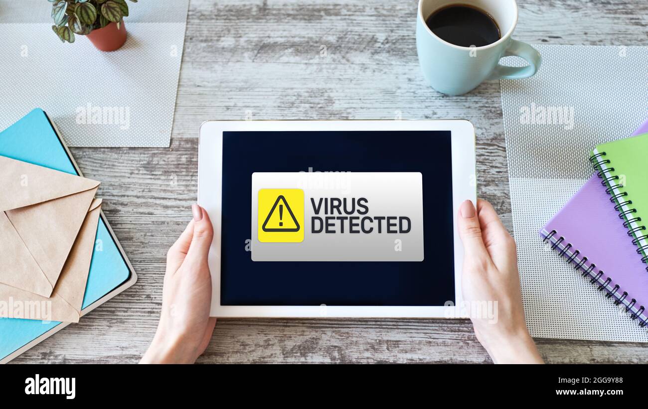 Virus Detected warning message on screen. Cyber security breach. Data ...