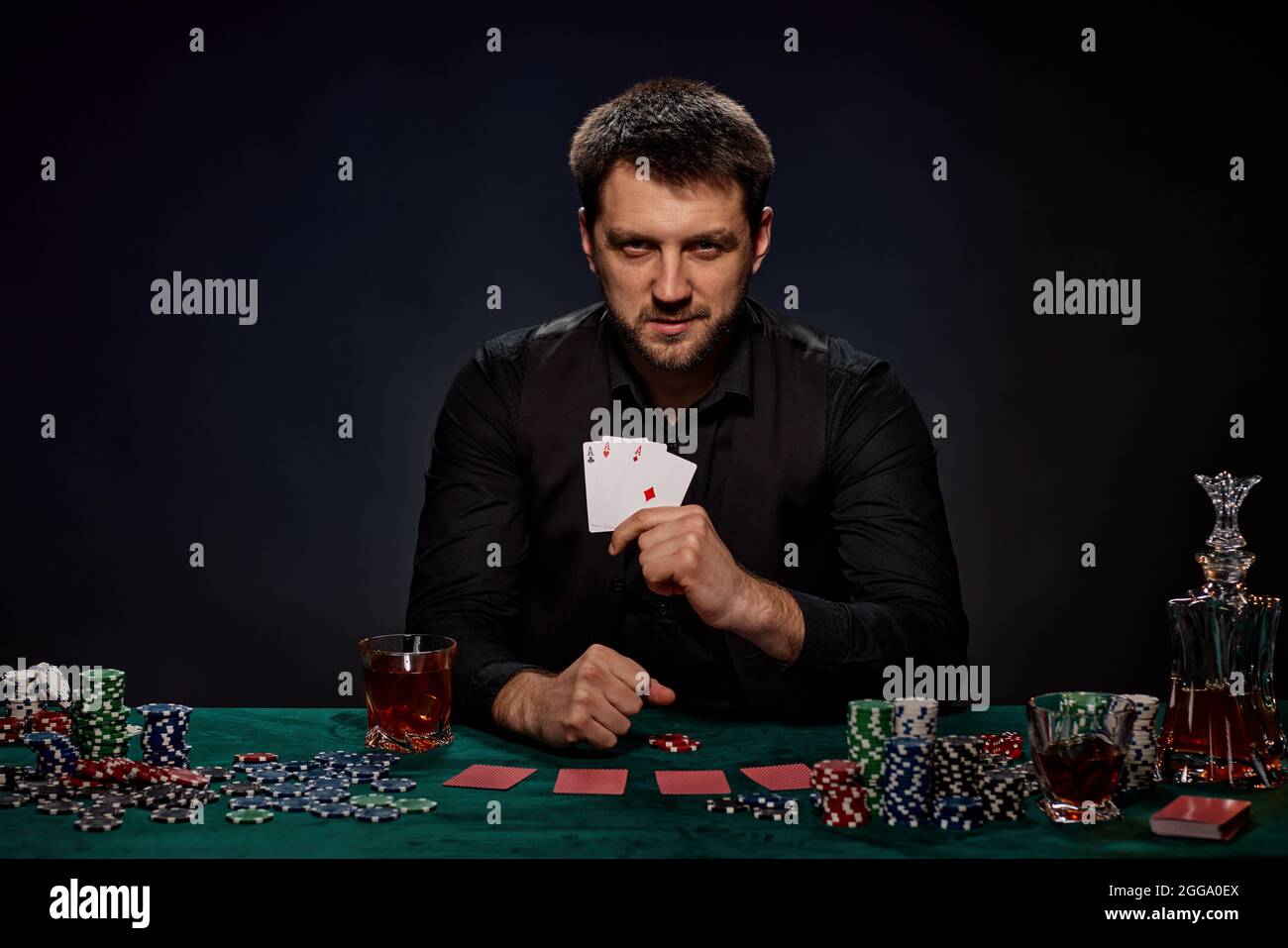 People sitting poker table playing hi-res stock photography and images ...