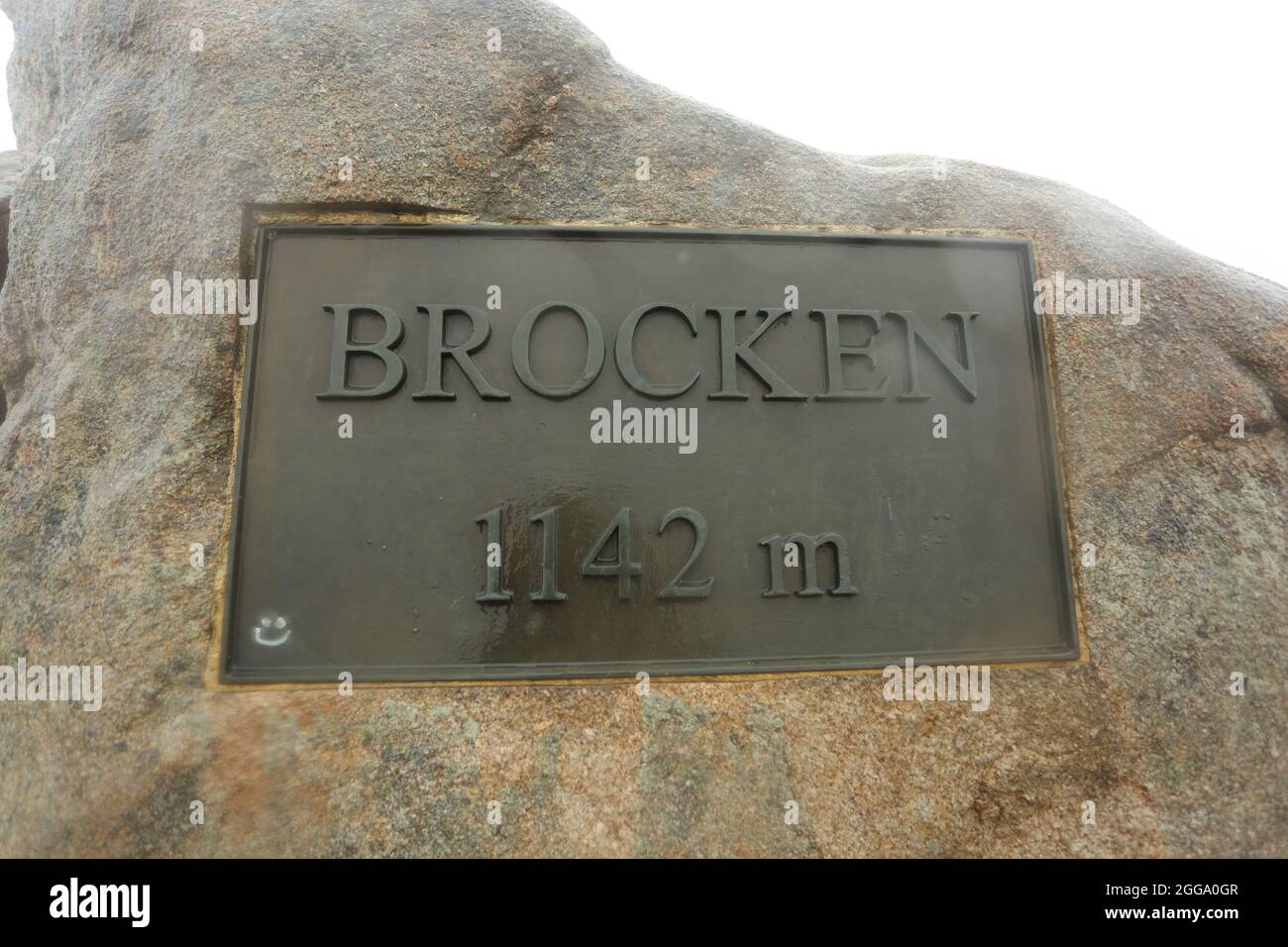 Schierke, Germany. 30th Aug, 2021. A bronze plaque is embedded in a ...