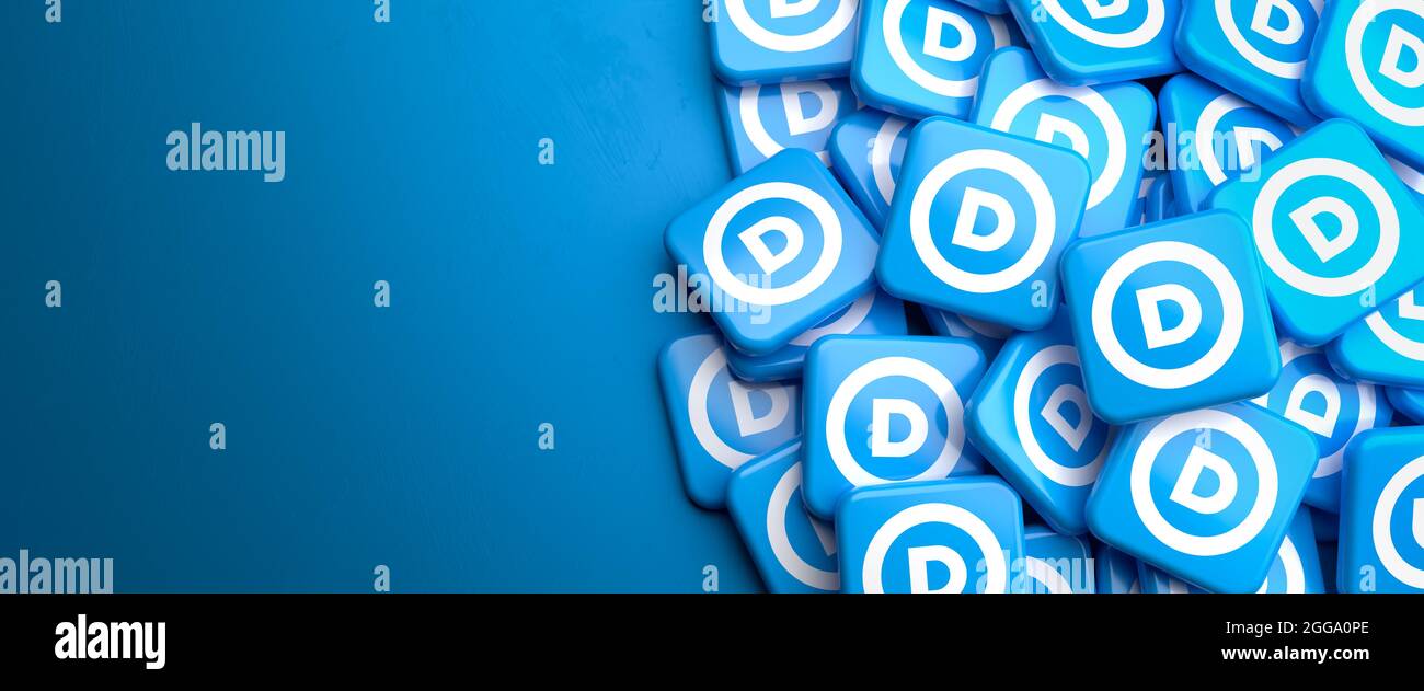 Logos of the United States Democratic Party on a heap on a table. Copy ...