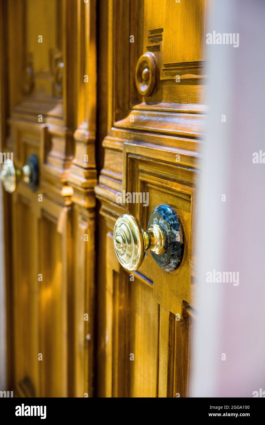 vertical shot of vintage door handles at golden hour Stock Photo - Alamy
