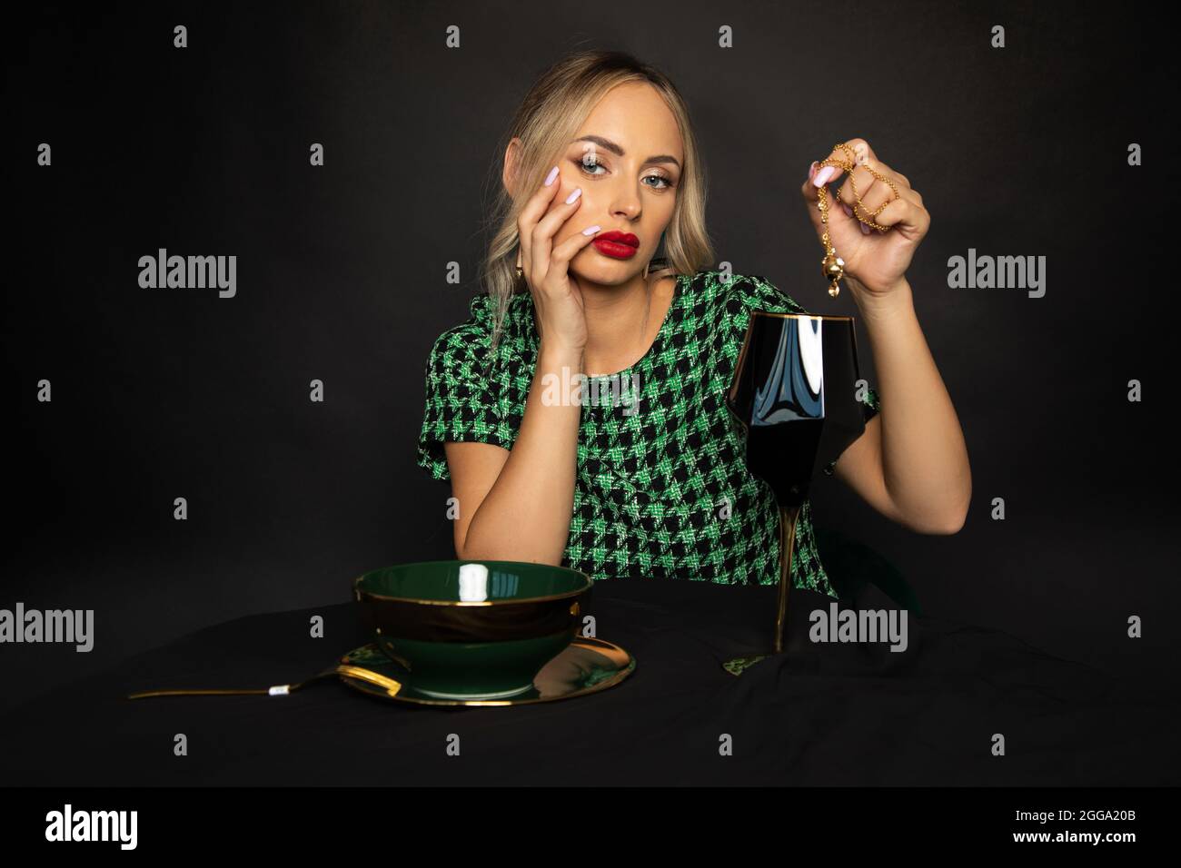 Beautiful young witch woman with red lipstick on her lips and makeup ...