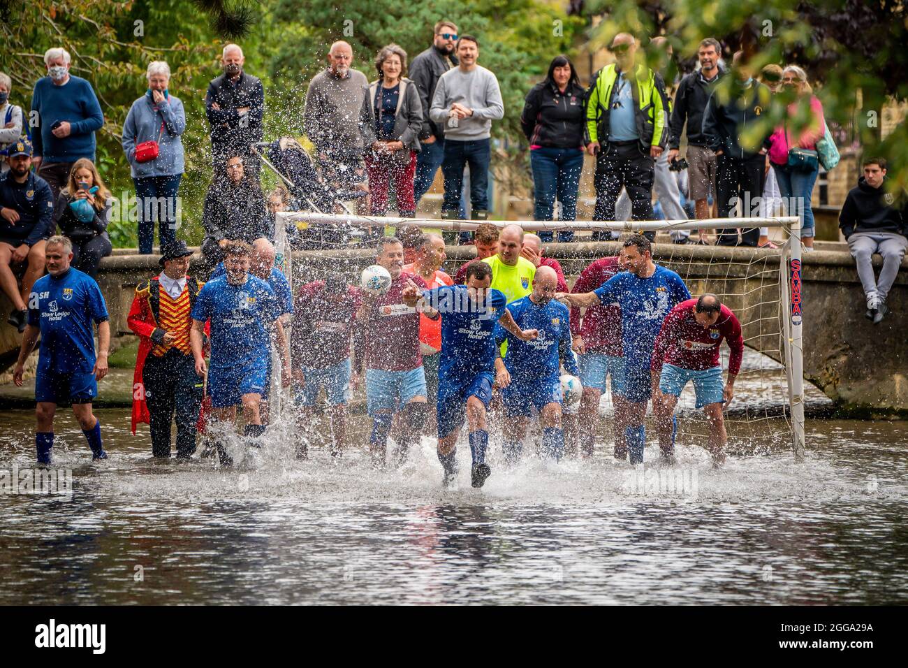 Footballers from Bourton Rovers create a splash in the River Windrush ...