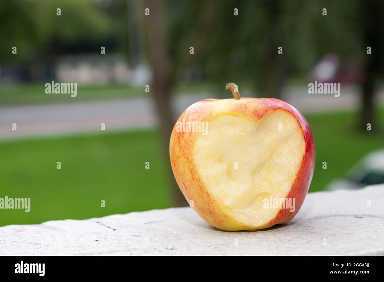 Closeup shot of a bitten red apple Stock Photo - Alamy