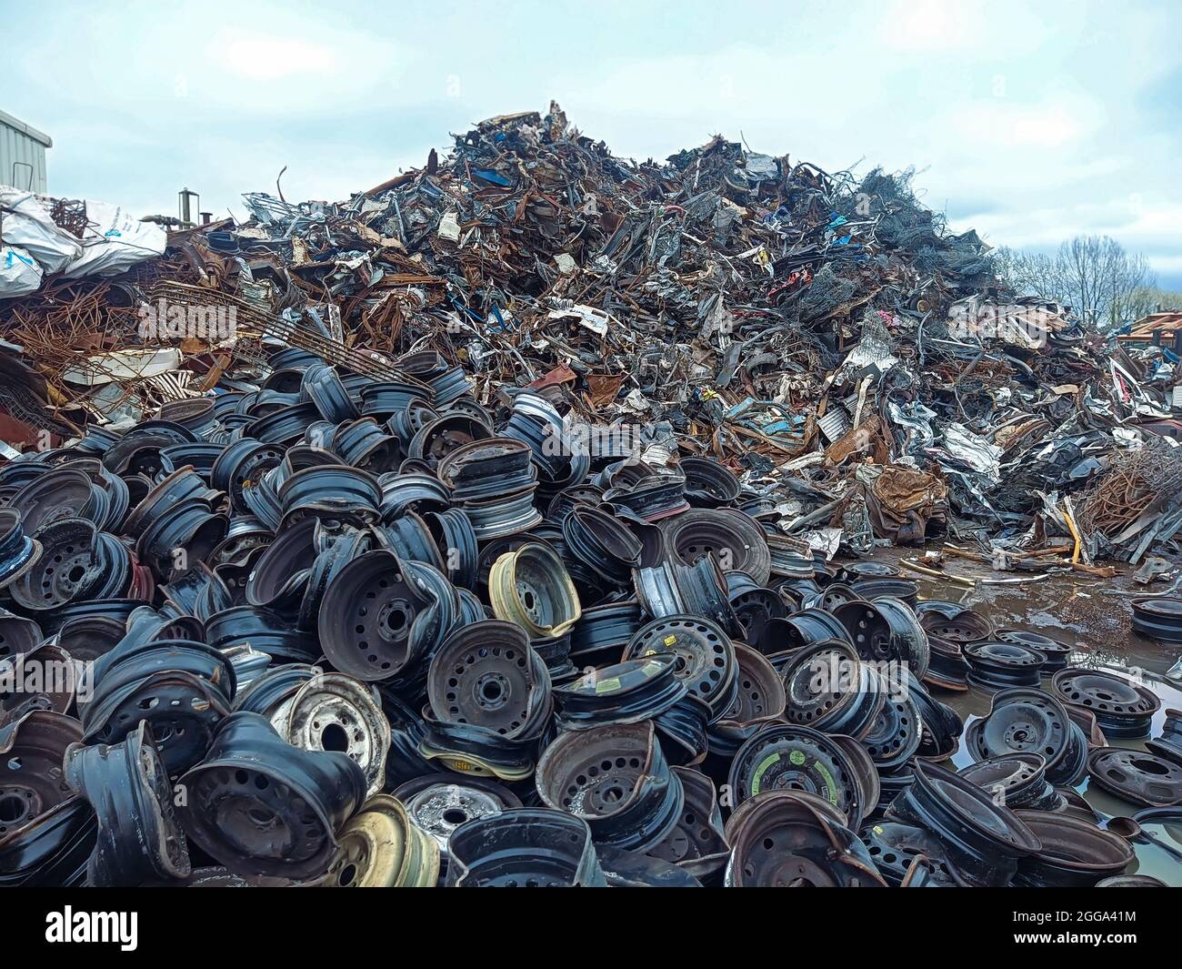 Scrap metal prepared for shipment by sea transport for processing. Car ...