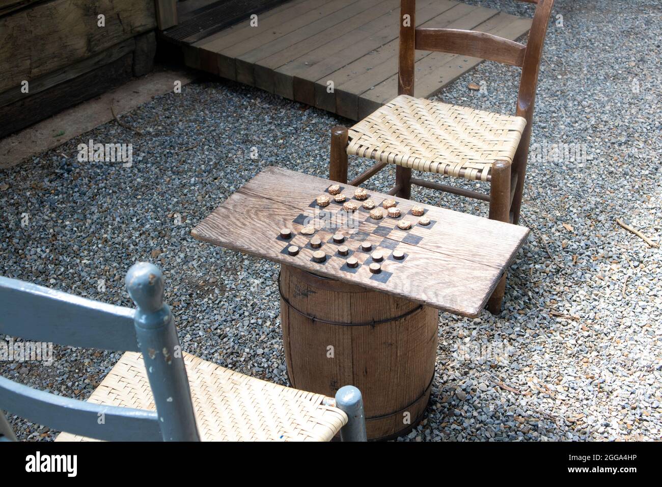 Checkers game made from wood and corn cob pieces on a barrel wit Stock ...