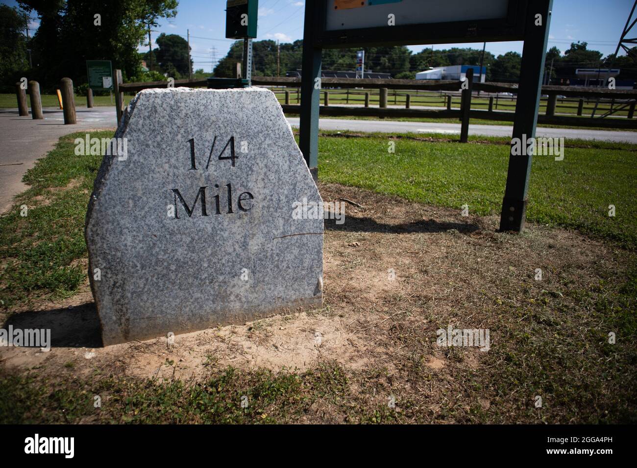 Sign showing a milestone on the one mile trail Stock Photo - Alamy